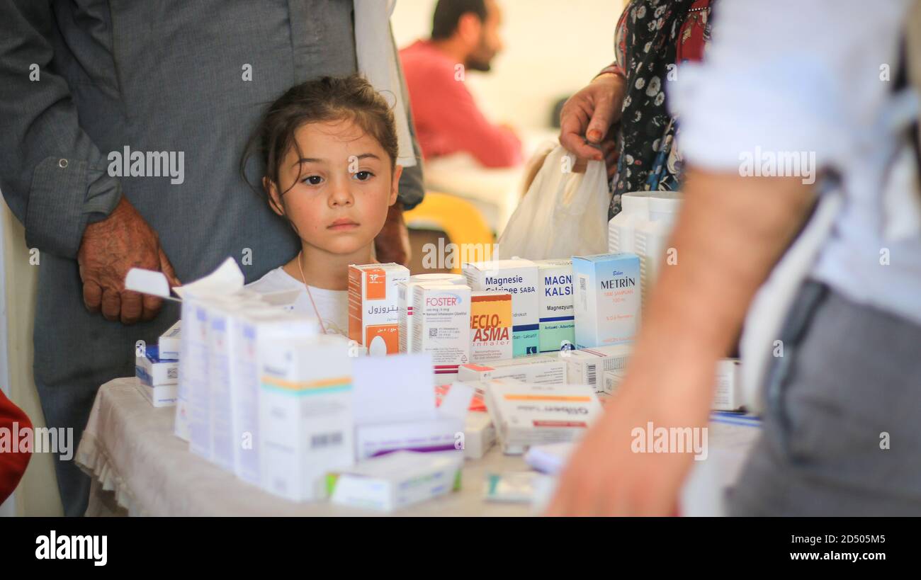 tired child, a sad child's face, sick children waiting to enter the ...