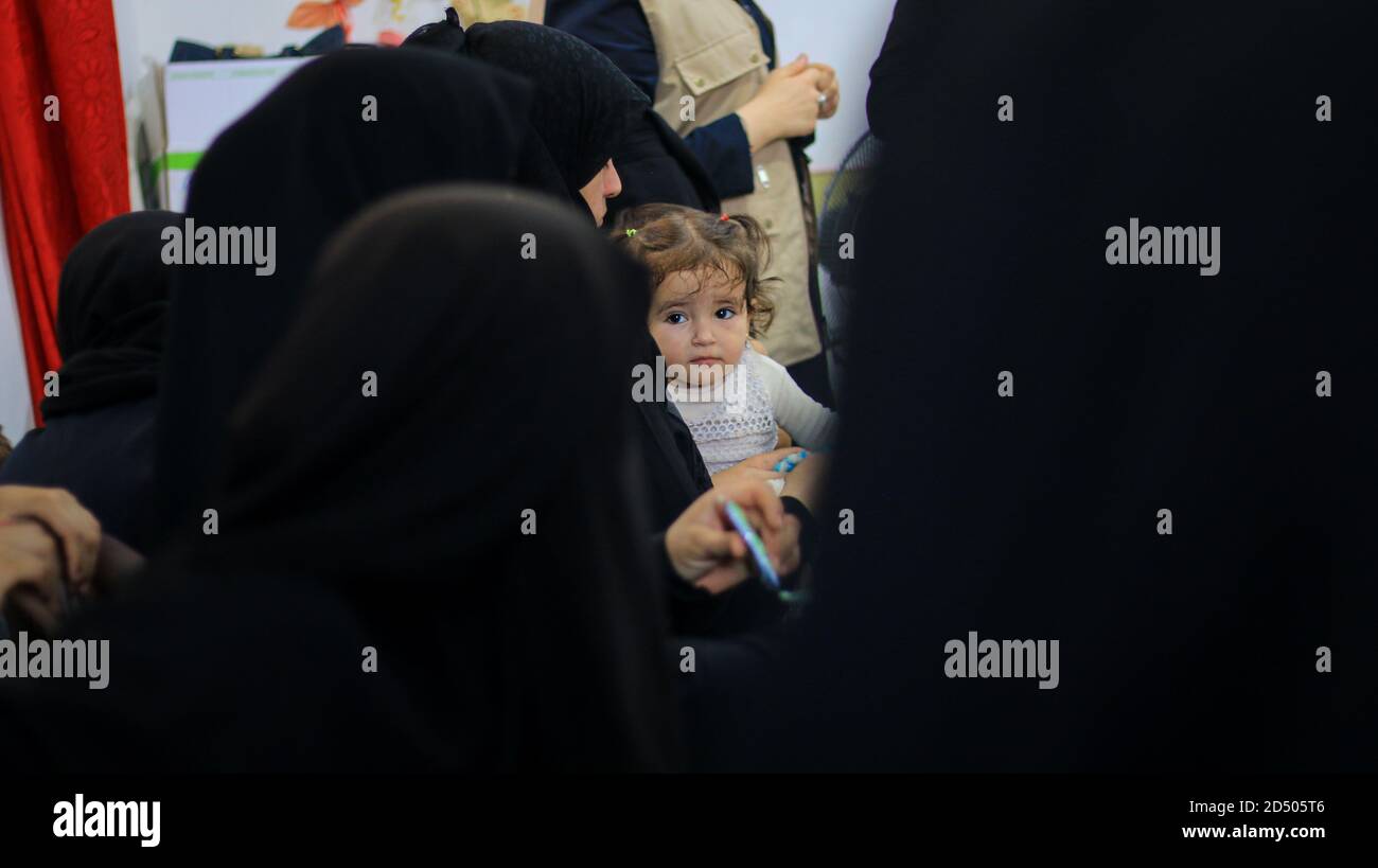 tired child, a sad child's face, sick children waiting to enter the ...