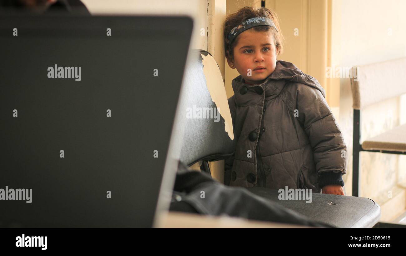 tired child, a sad child's face, sick children waiting to enter the ...