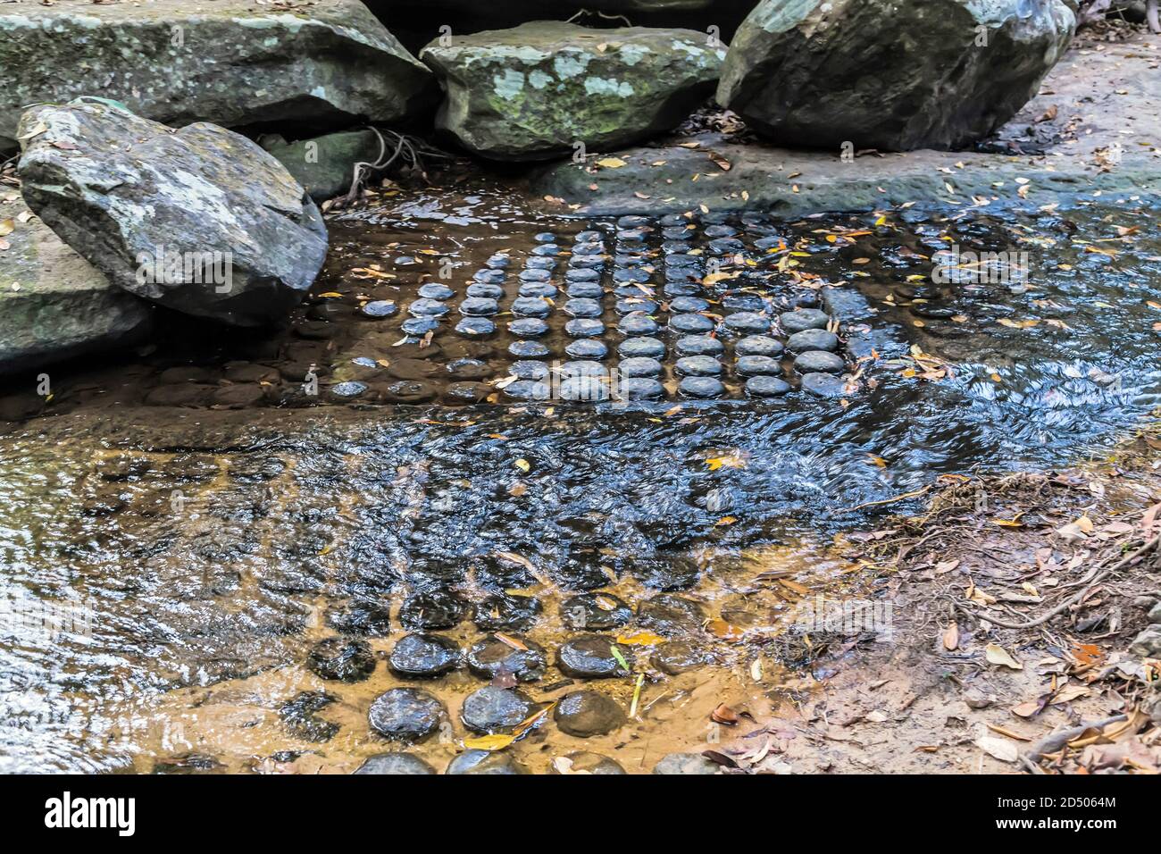 Sahasralingas or 1000 lingas in the rocky bed of Kbal Spean River. Siem ...