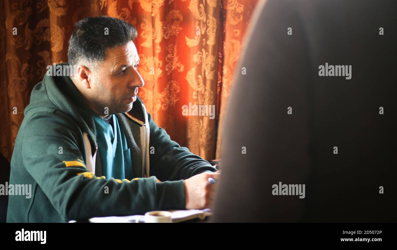 A friendly dialogue between the doctor and the patient, the doctor ...