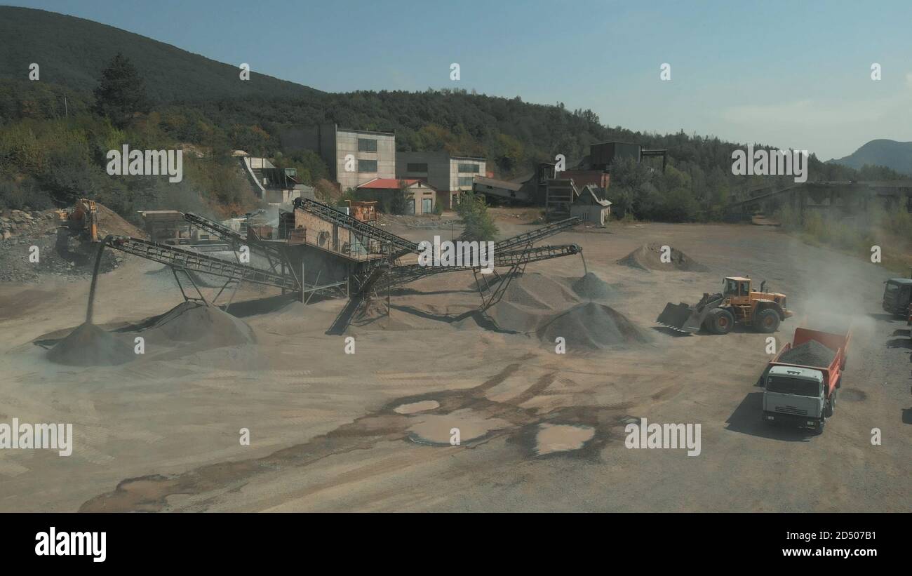 Earthmoving machine for excavation and dumping Stock Photo - Alamy