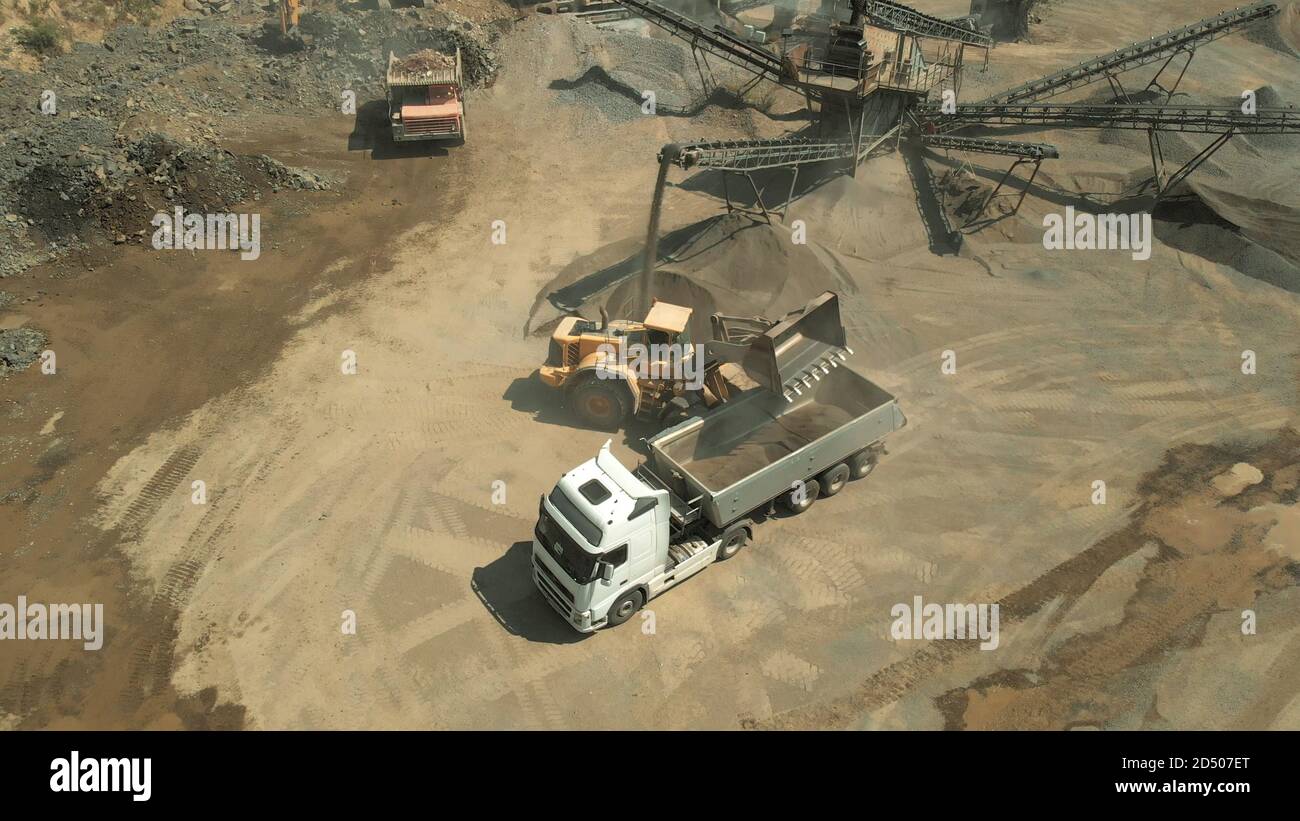 The process of loading coal into a truck Stock Photo - Alamy
