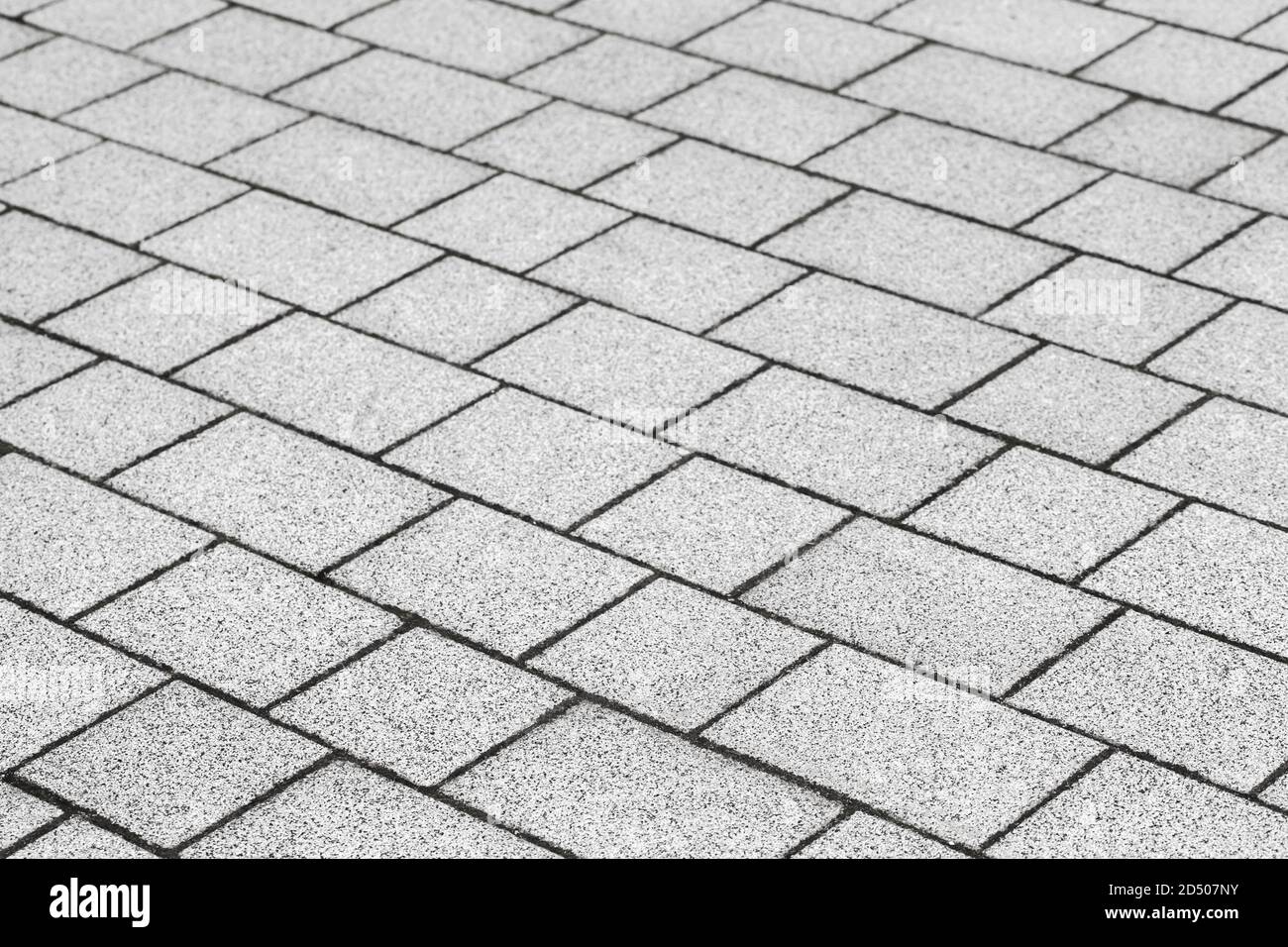 Gray concrete cobble road background photo texture Stock Photo - Alamy