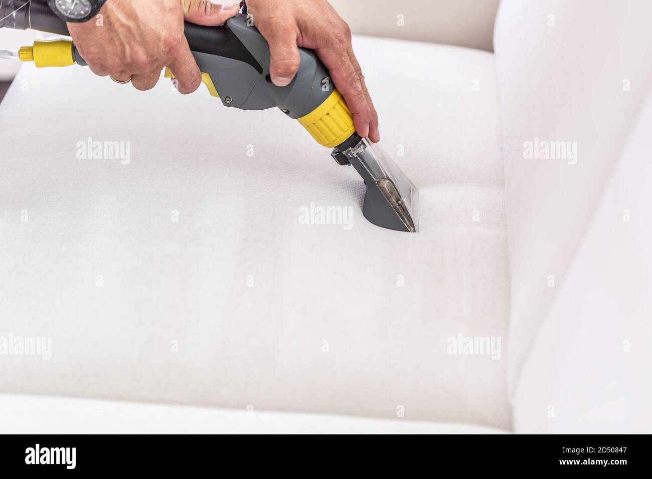Shampoo cleaning of a white sofa in detail Stock Photo - Alamy