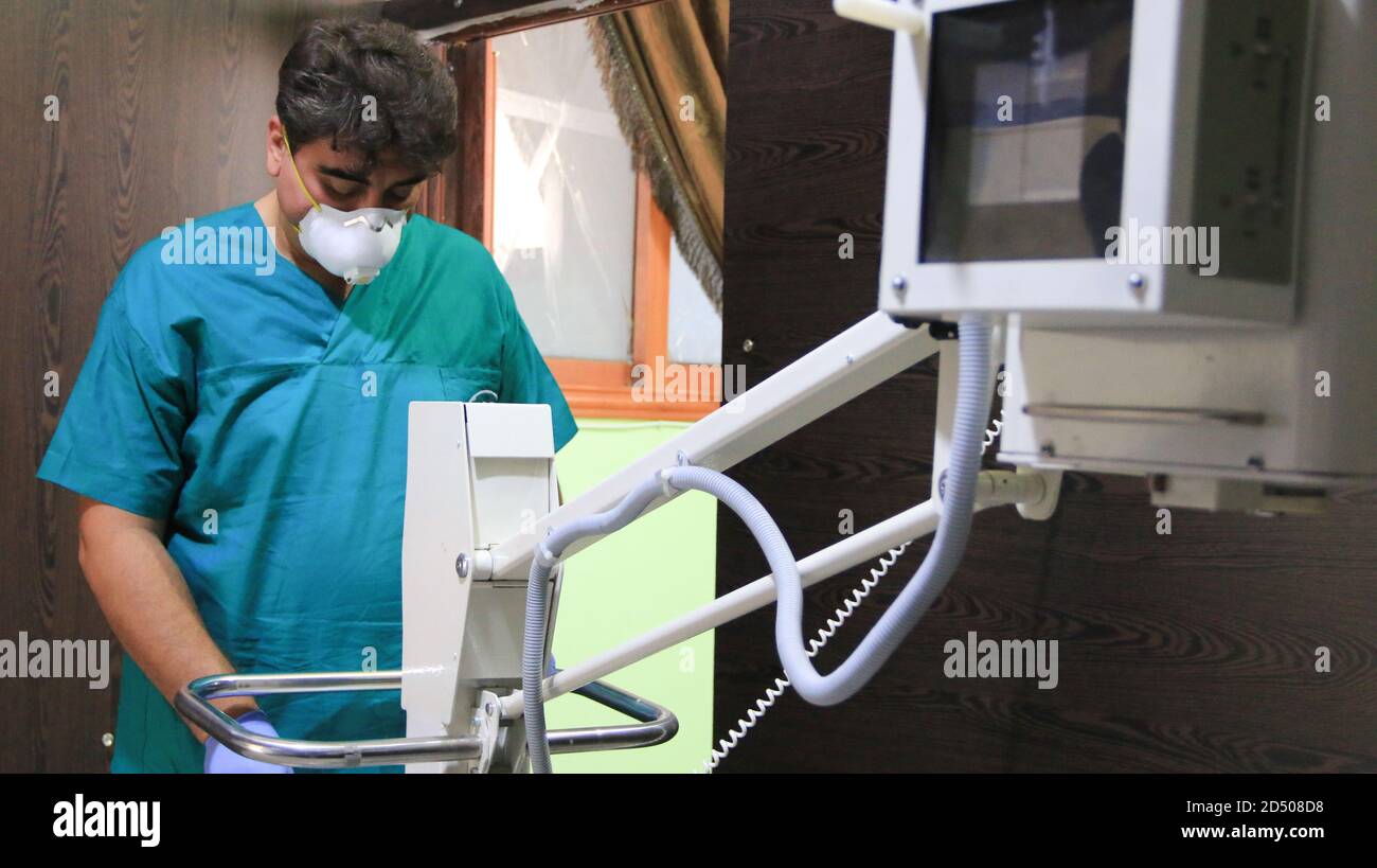 Hospital Radiographer With male Patient Operating CT Scanner Stock ...