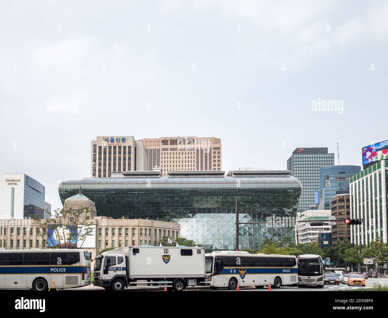 Seoul, South Korea - Old and new building of Seoul City Hall. Police ...