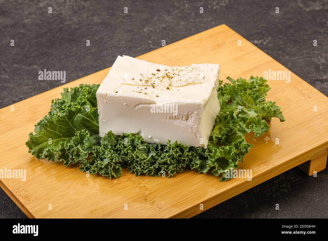 Traditional tasty Greek Feta soft cheese brick Stock Photo - Alamy