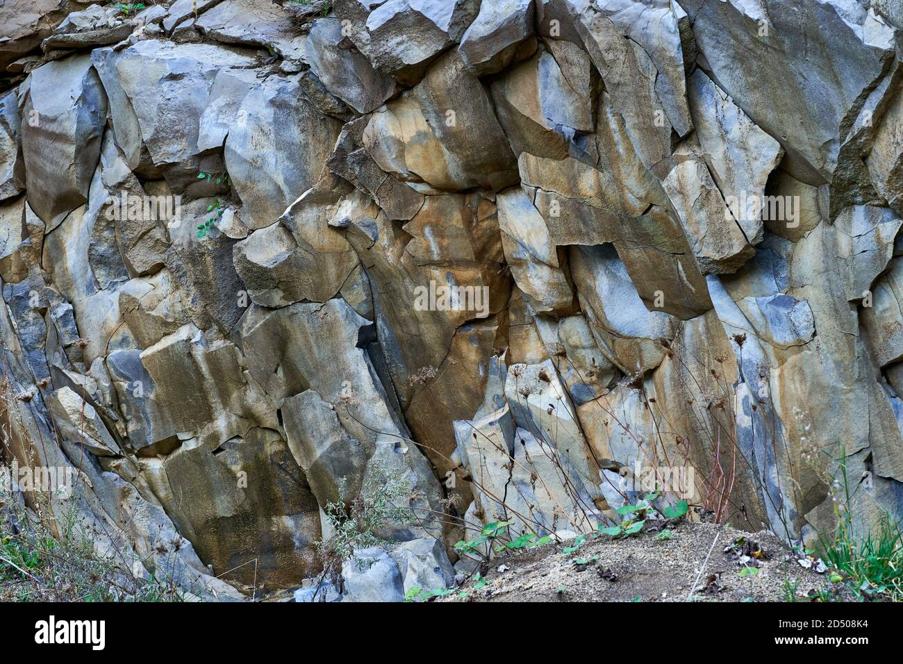 Various rock formation in geological layers in an abandoned quarry ...