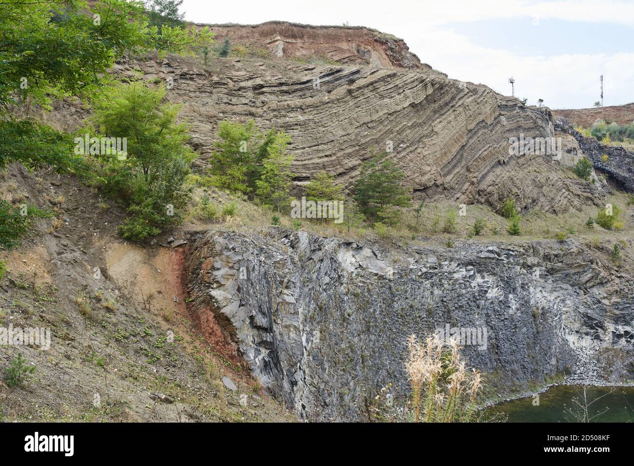 Various rock formation in geological layers in an abandoned quarry ...
