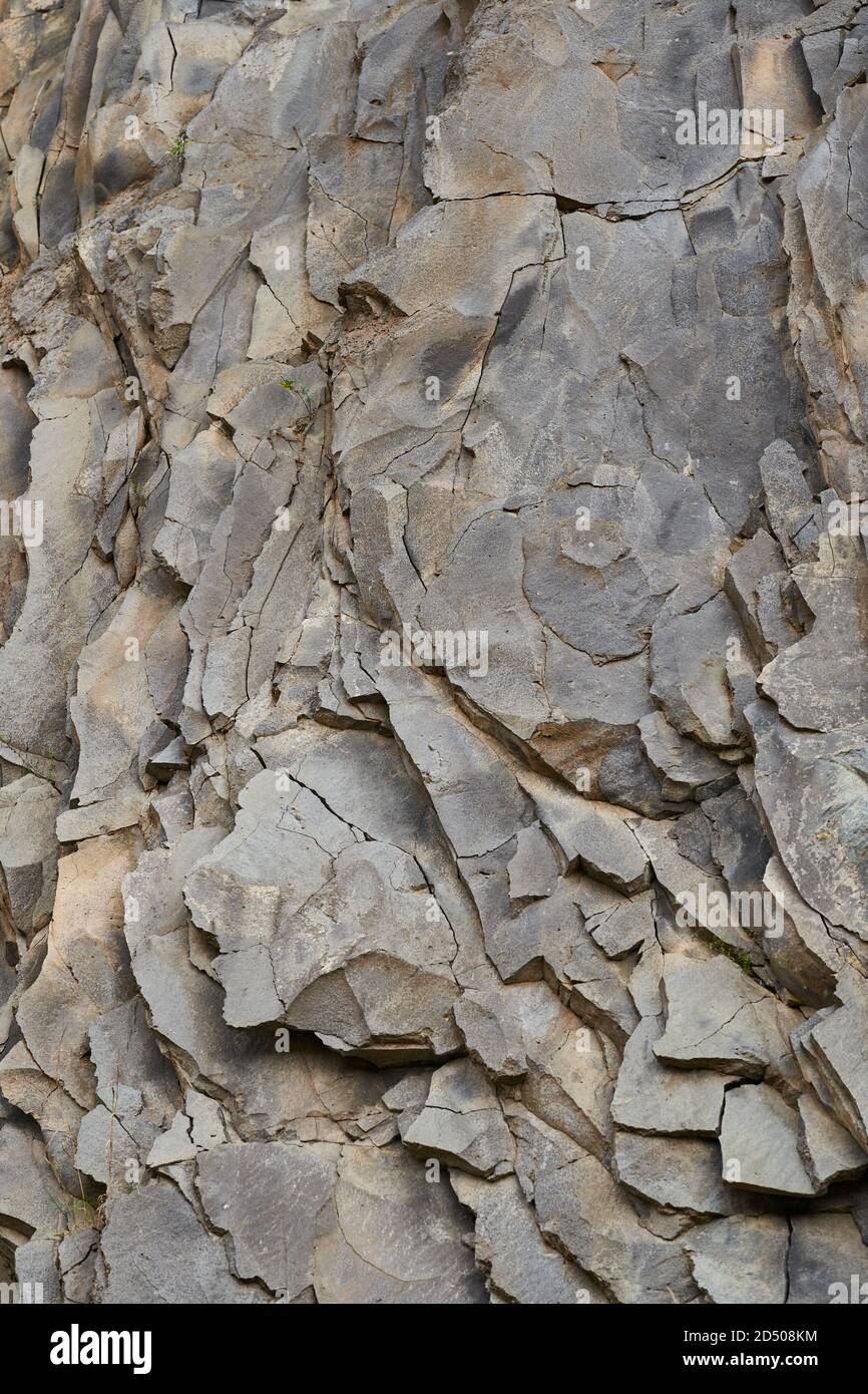 Various rock formation in geological layers in an abandoned quarry ...