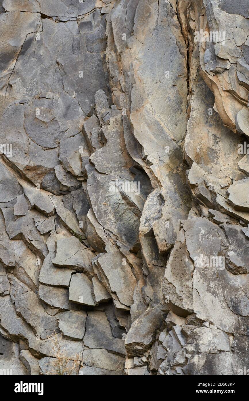 Various rock formation in geological layers in an abandoned quarry ...