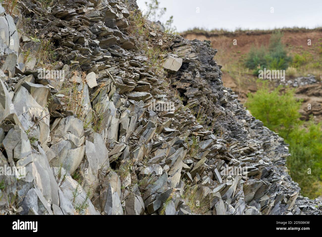 Various rock formation in geological layers in an abandoned quarry ...