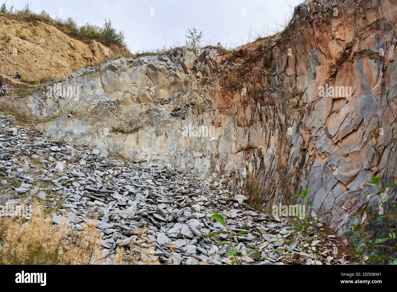 Various rock formation in geological layers in an abandoned quarry ...