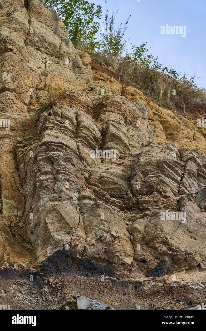 Various rock formation in geological layers in an abandoned quarry ...