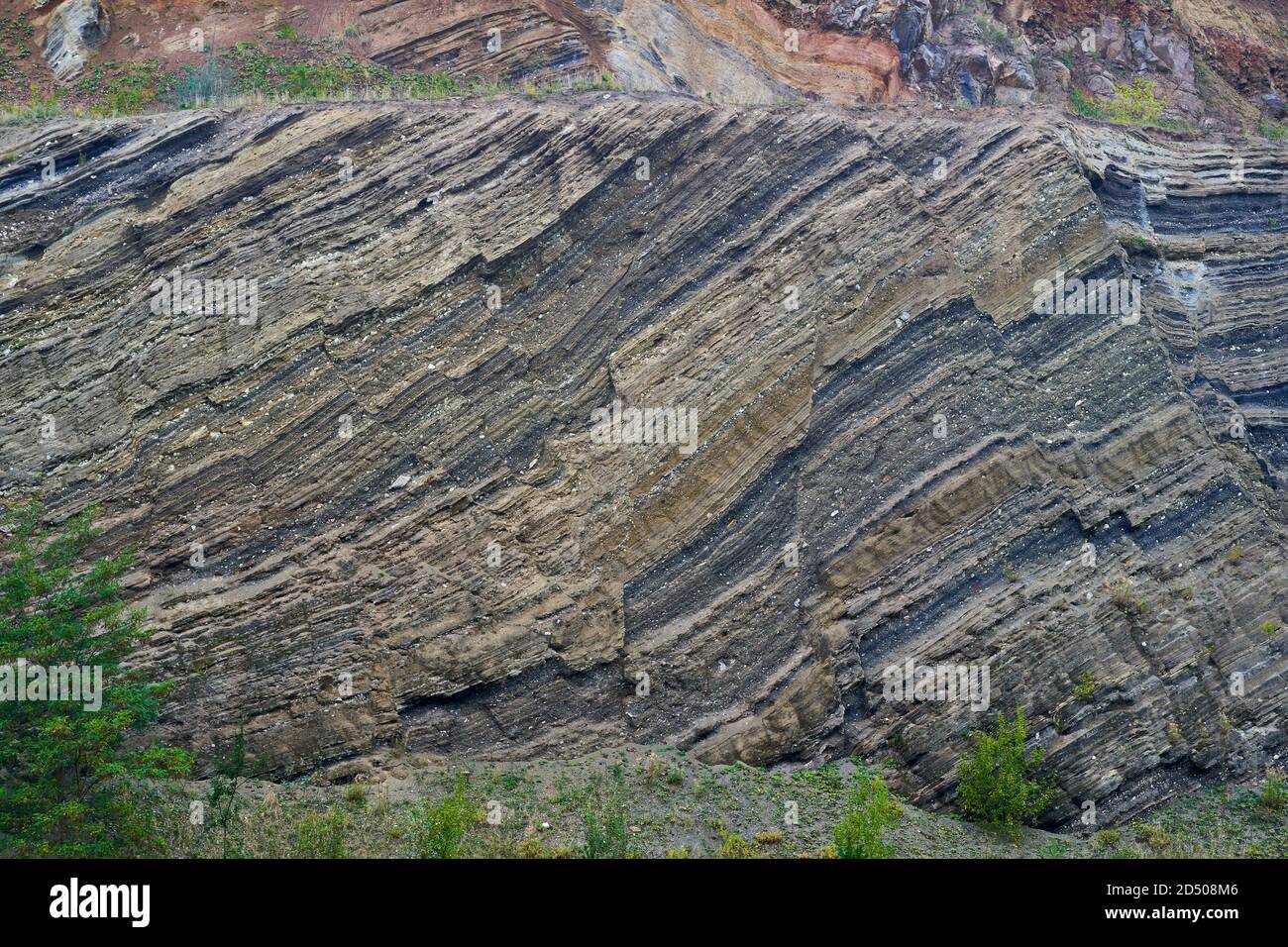 Various rock formation in geological layers in an abandoned quarry ...