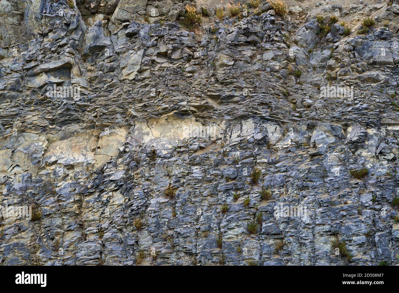 Various rock formation in geological layers in an abandoned quarry ...