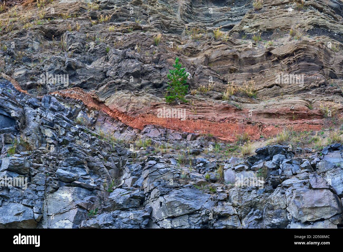 Various rock formation in geological layers in an abandoned quarry ...