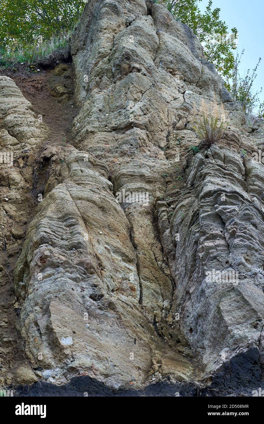 Various rock formation in geological layers in an abandoned quarry ...