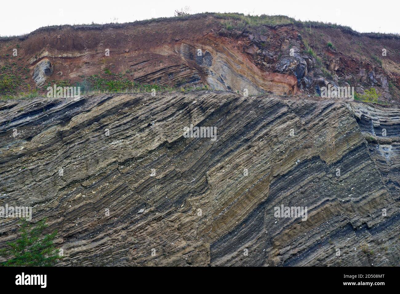 Various rock formation in geological layers in an abandoned quarry ...