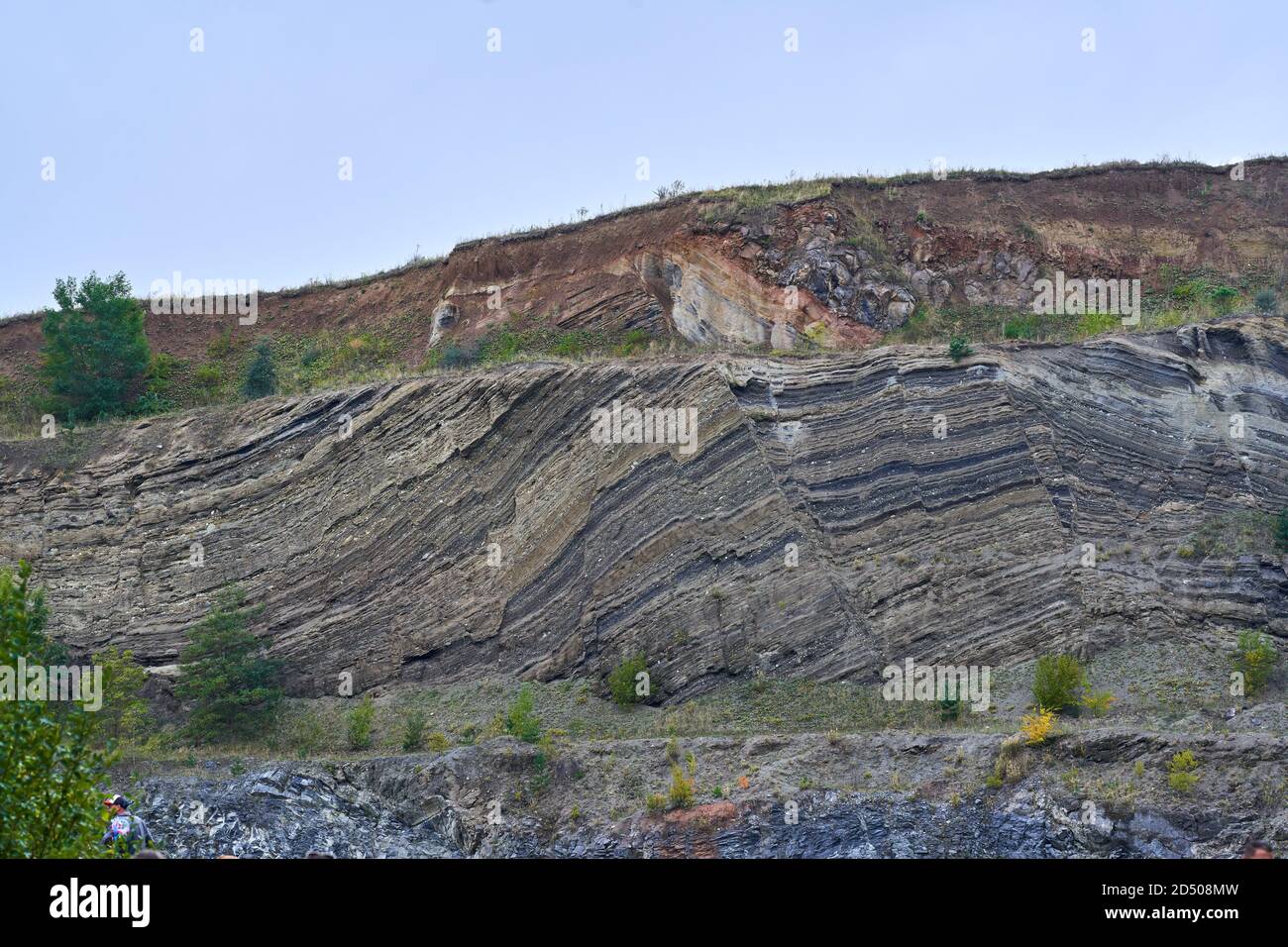 Various rock formation in geological layers in an abandoned quarry ...