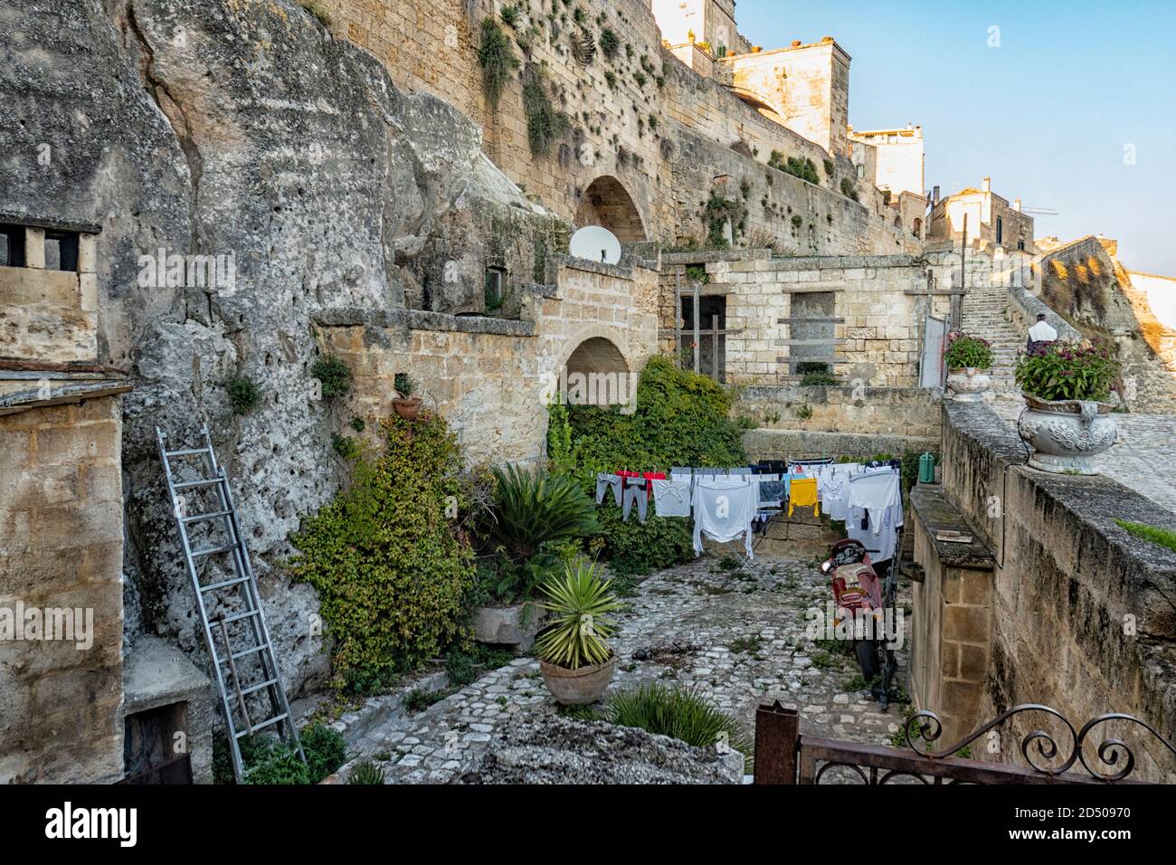 House with patio in the ancient cave city of Matera, Puglia, Italy, an ...