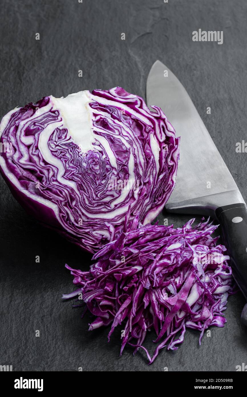 Red cabbage on black stone background Stock Photo - Alamy