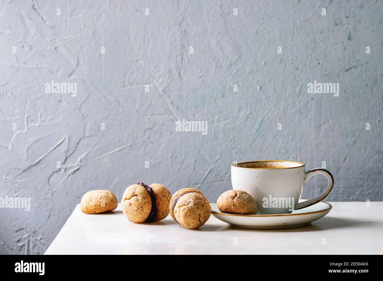 Baci di dama homemade italian hazelnut biscuits cookies with chocolate ...