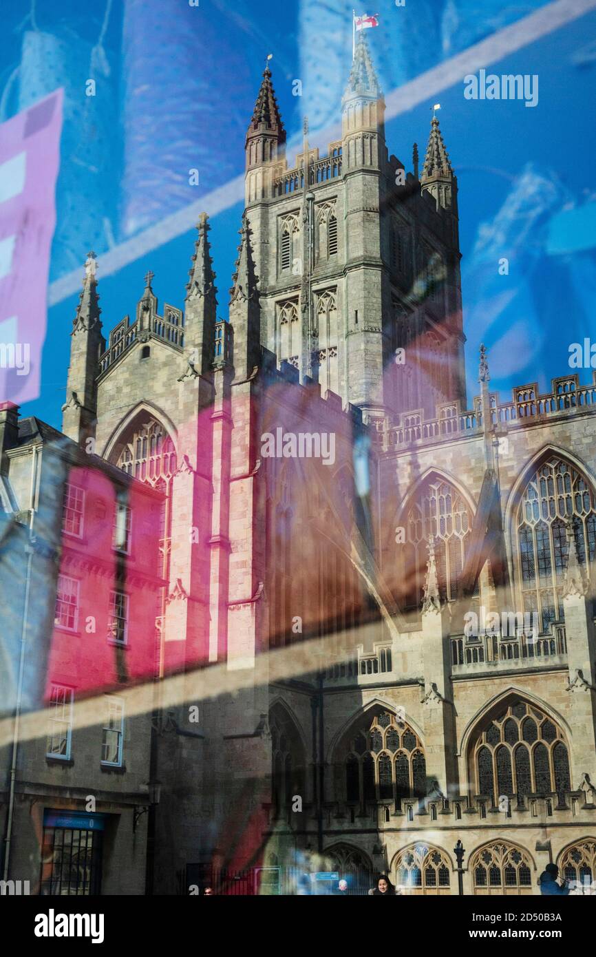 Reflection of Bath Abbey in a shop window, Bath UK Stock Photo - Alamy