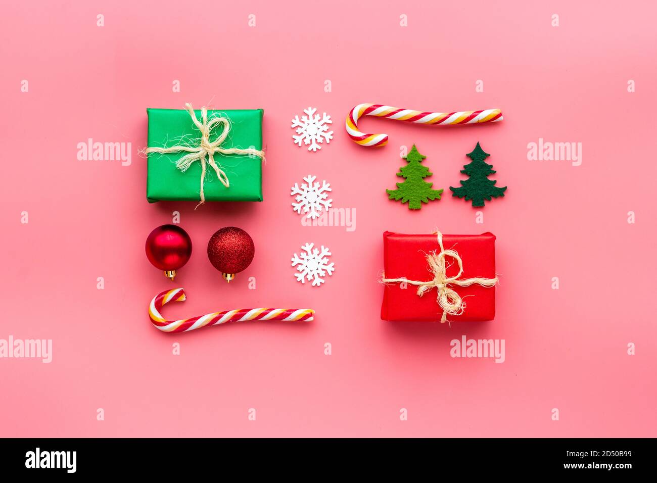 Christmas table layout with gifts and decorations Stock Photo - Alamy