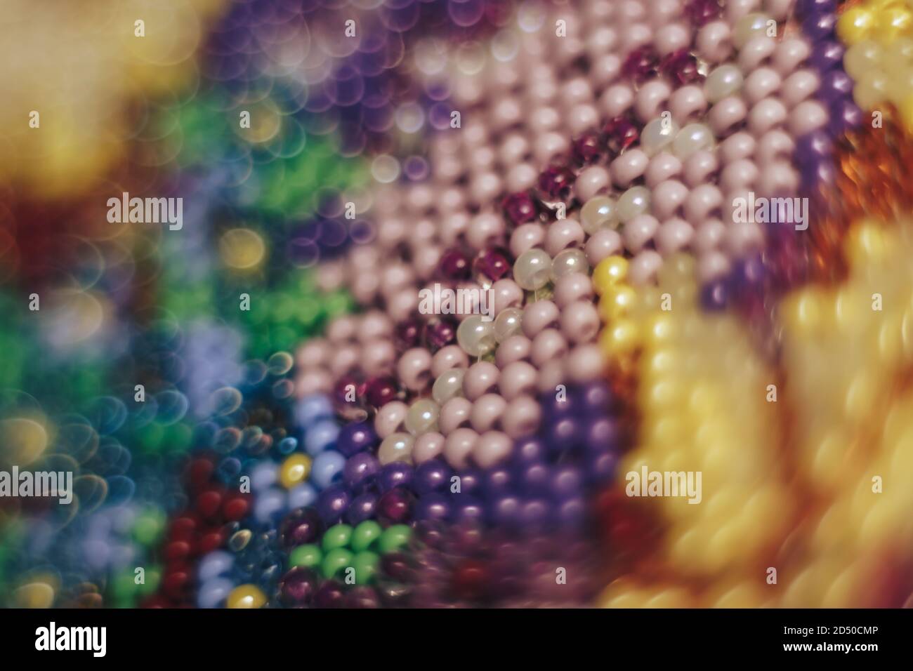 Multi colored glass beads on a white background texture pattern for ...