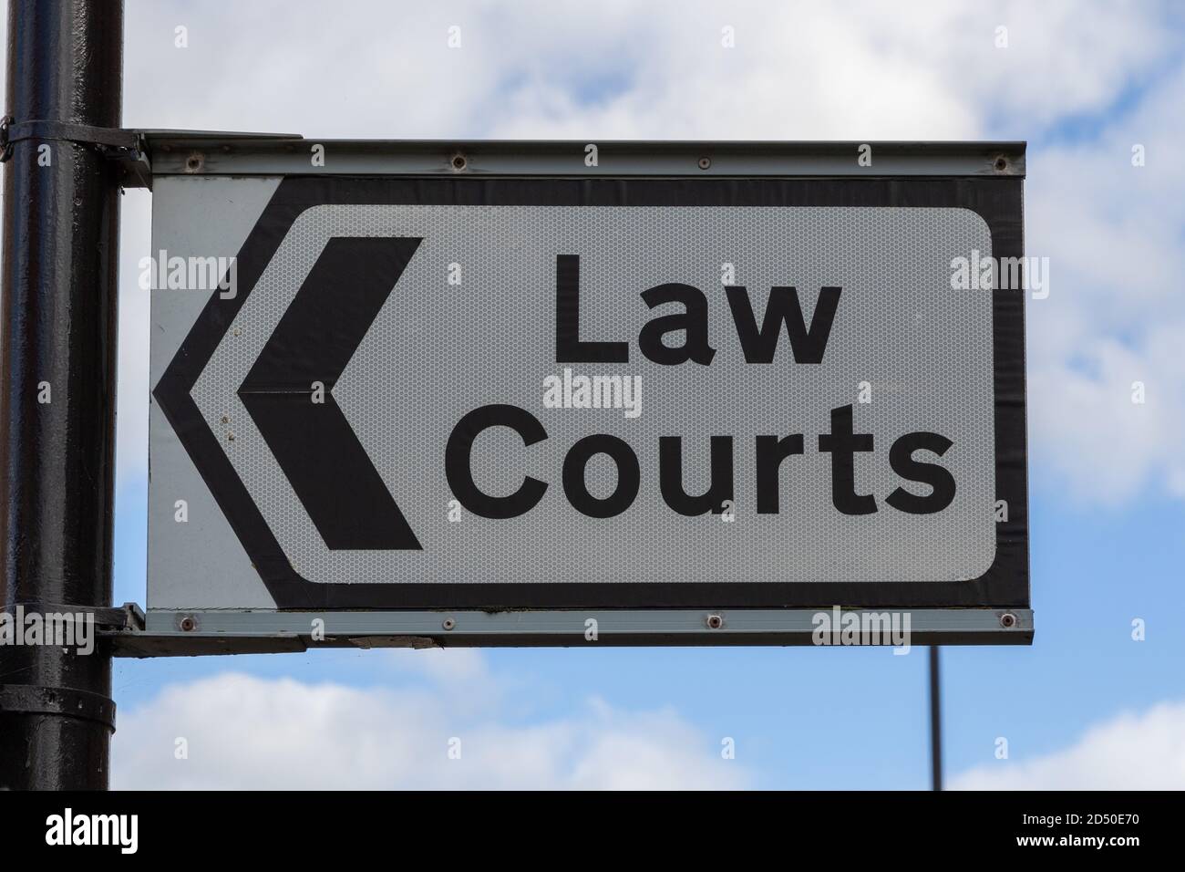 Law Courts traffic directional sign, pointing left Stock Photo - Alamy