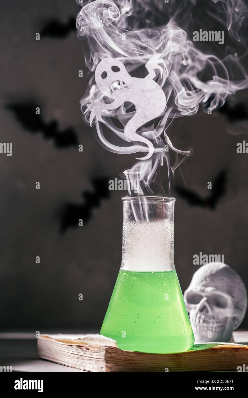 Lab bottle with little Ghost Stock Photo - Alamy
