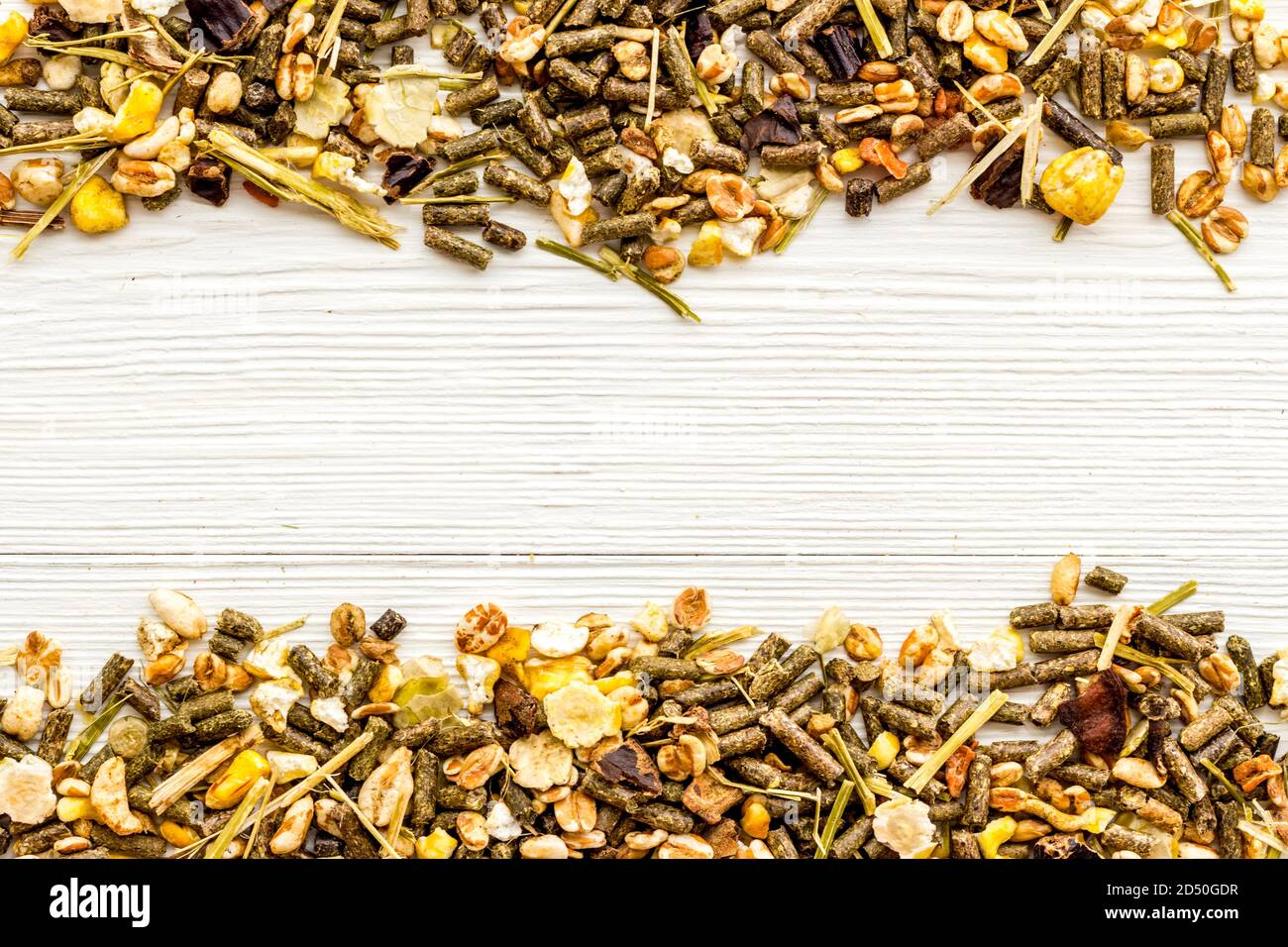 Rodent pet food background. Top, overhead view Stock Photo - Alamy