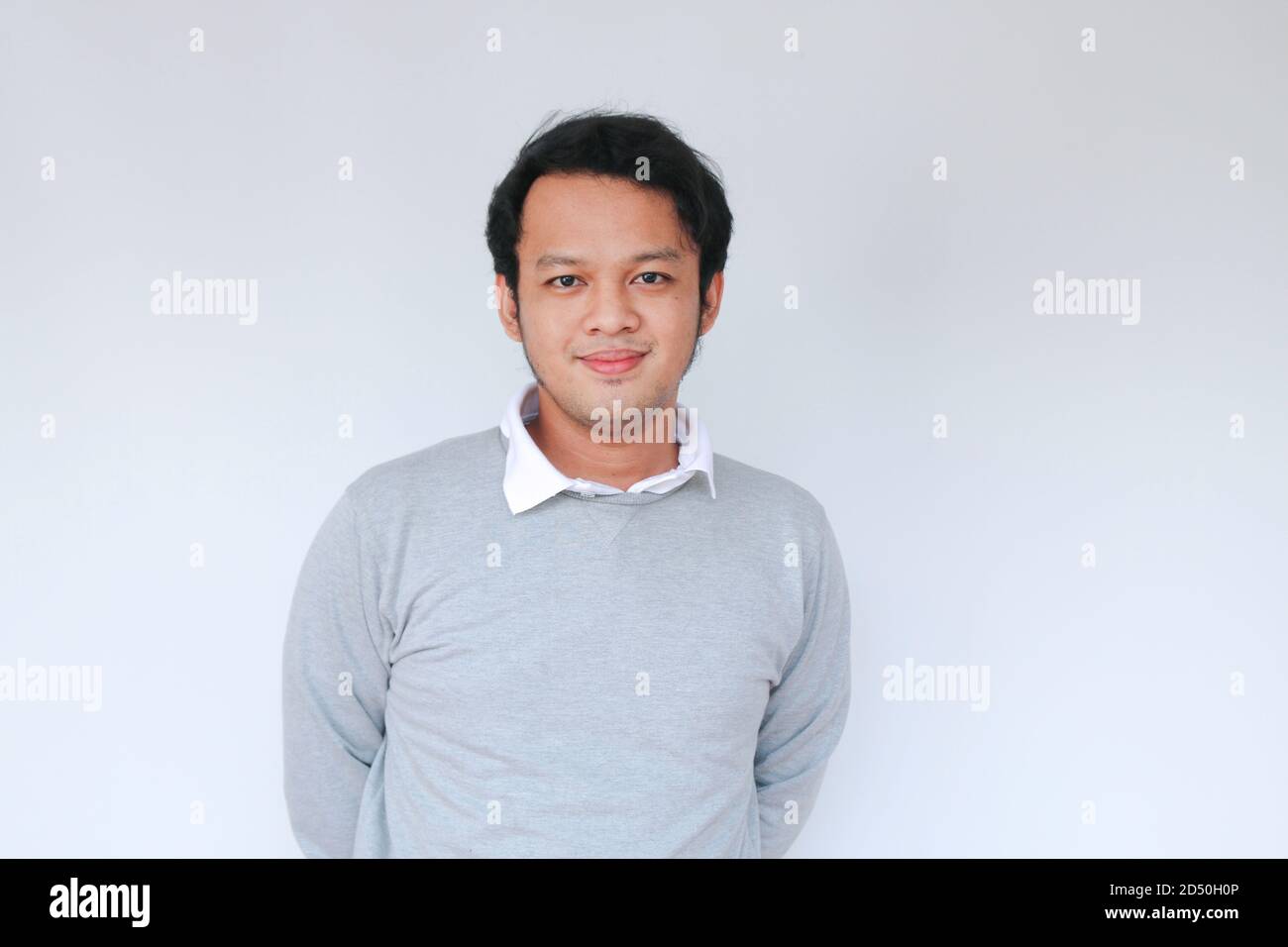 Cool smile face and pose of confidence Young Asian man Stock Photo - Alamy