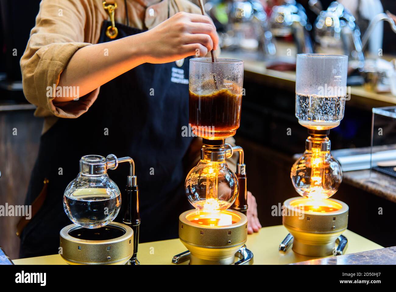 Bangkok, Thailand - 16 September, 2020: Barista making a coffee nitro ...