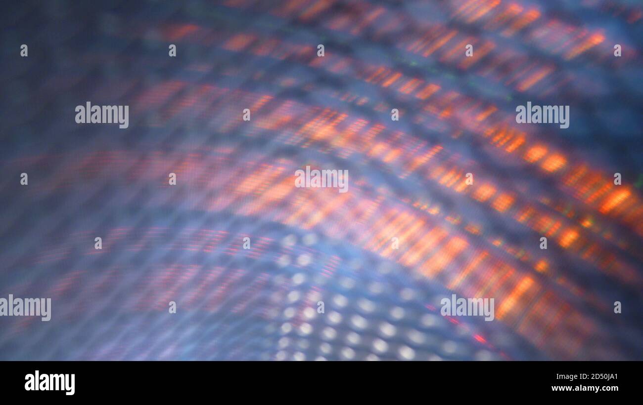 Progressive rhythmic orange and gray shaded light layers seen through a ...