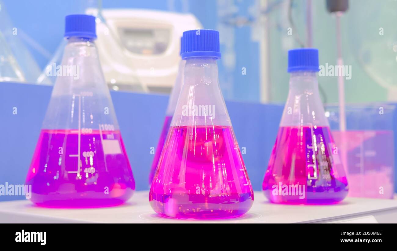 Magnetic mixer stirrer for mixing liquid in flasks at pharmacy lab ...