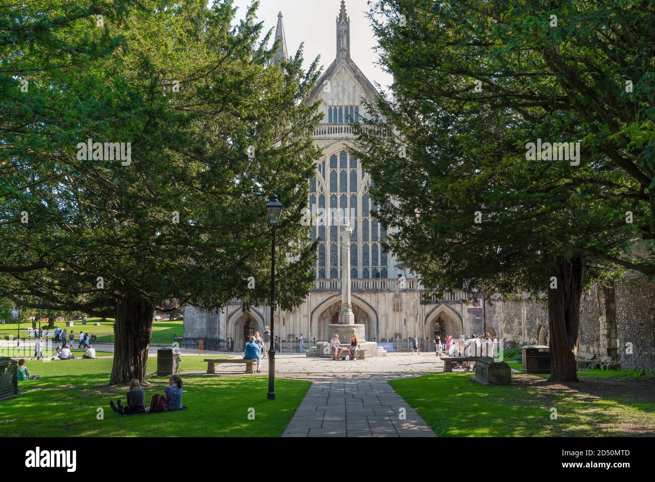 Winchester Cathedral, view in summer of people relaxing in the ...