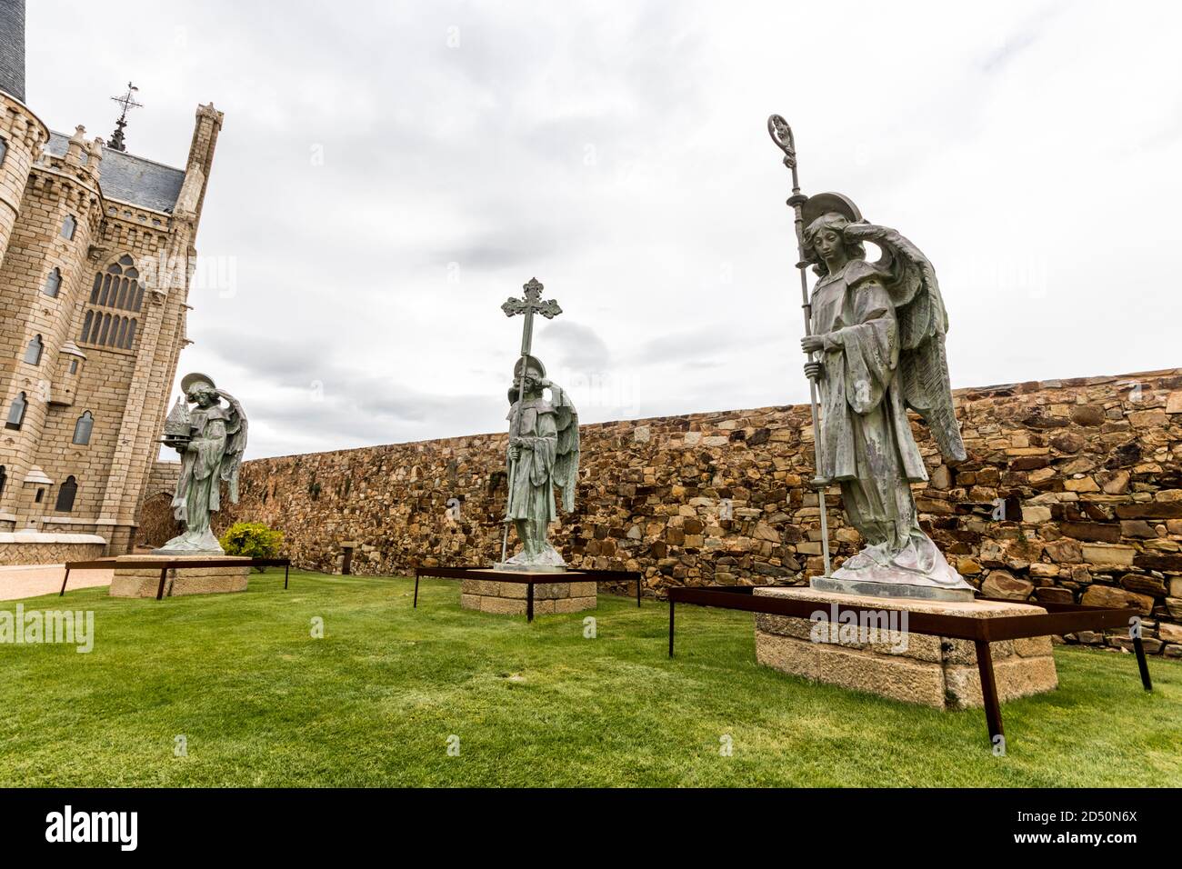 Astorga, Spain. Angels sculptures outside he Palacio Episcopal, a ...