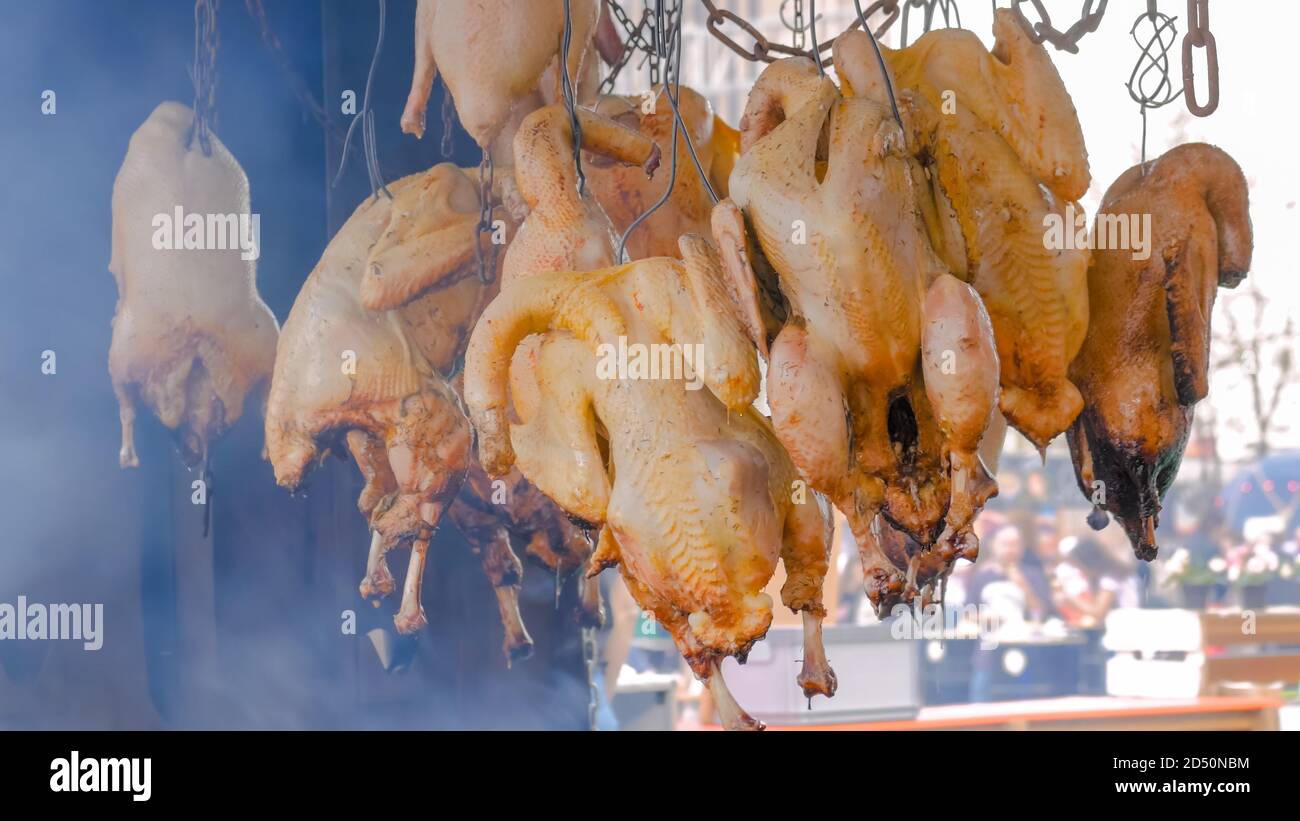 Hanging chickens hi-res stock photography and images - Alamy
