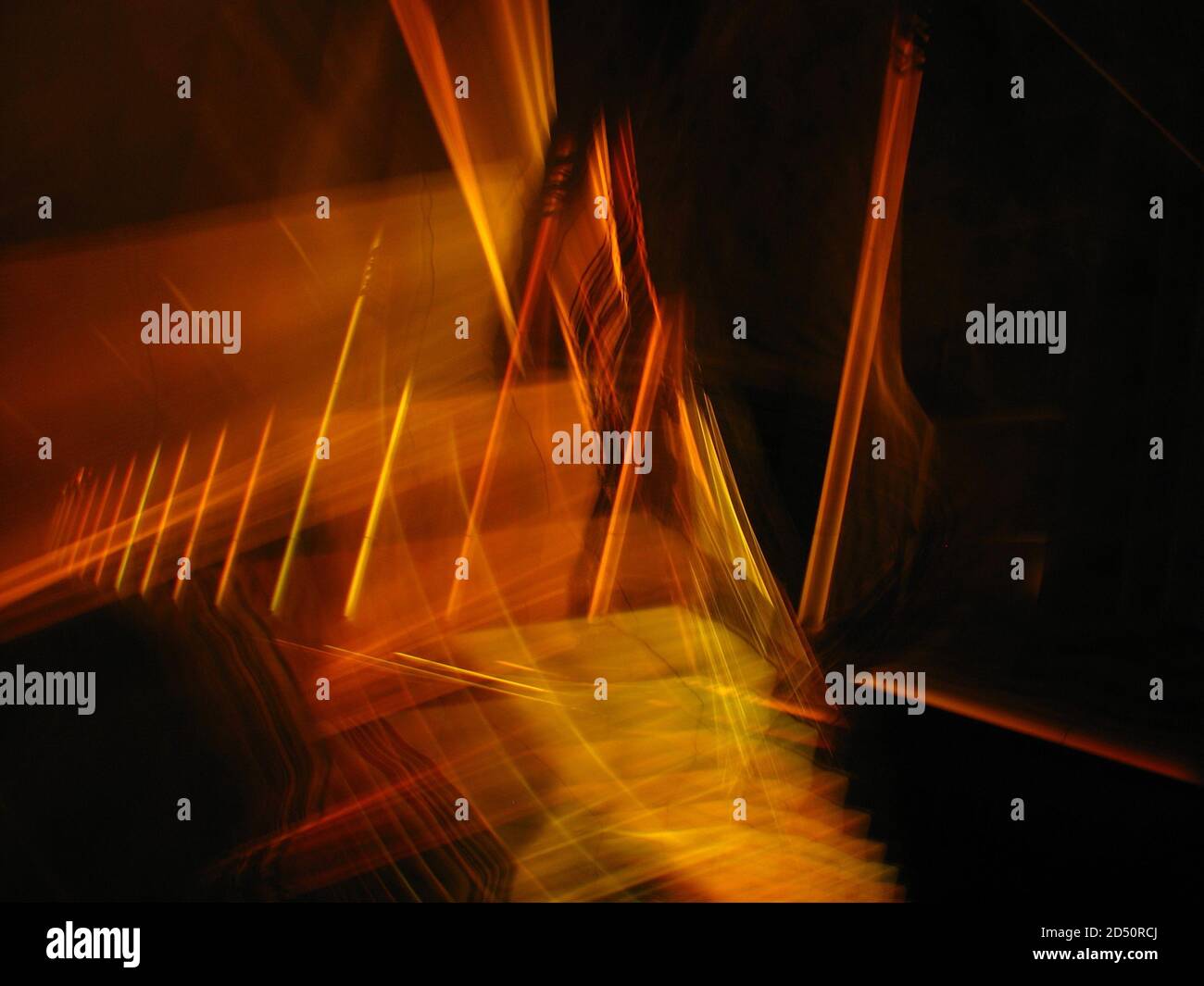 Vibrant golden light sources with layer textures for background or ...