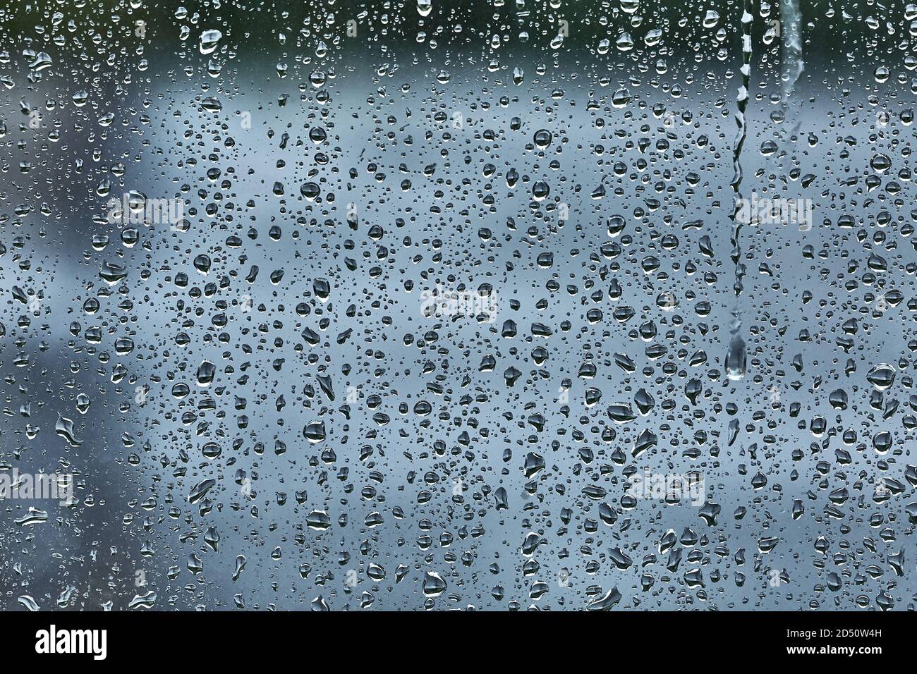 Rainy window surface Stock Photo - Alamy