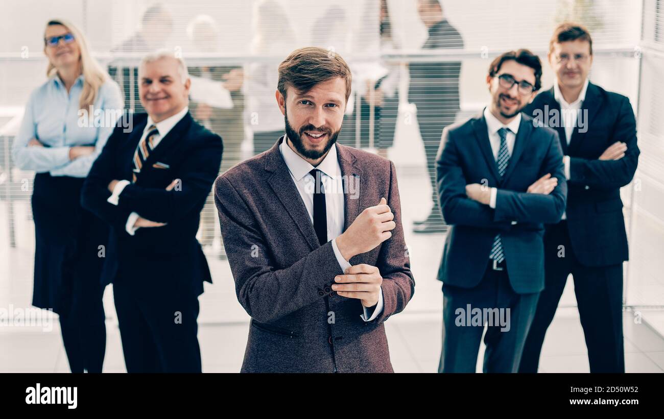 group of successful business people standing in the office Stock Photo ...