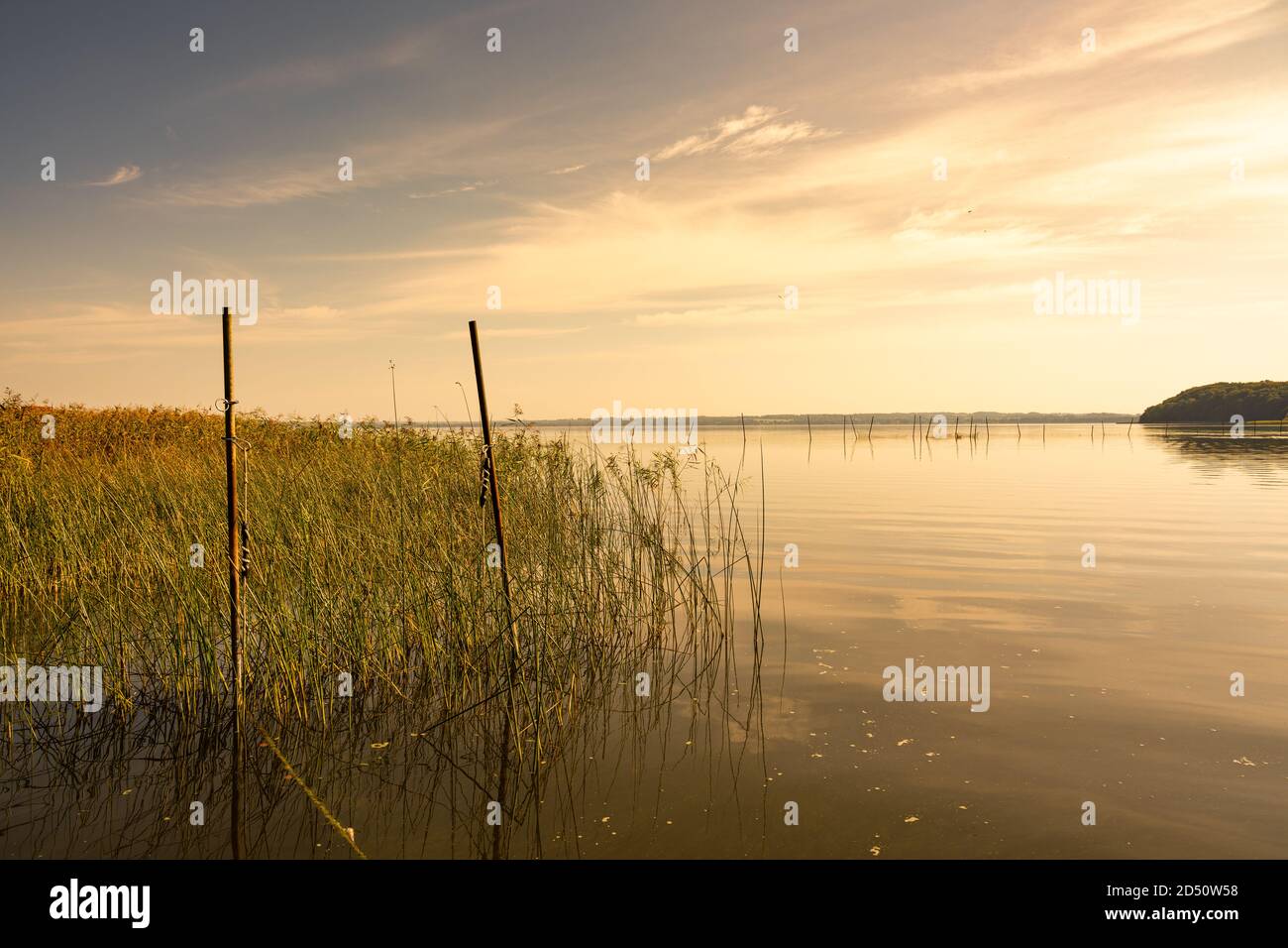 Beautiful sunset scenery of a lake one of the latest days of summer ...