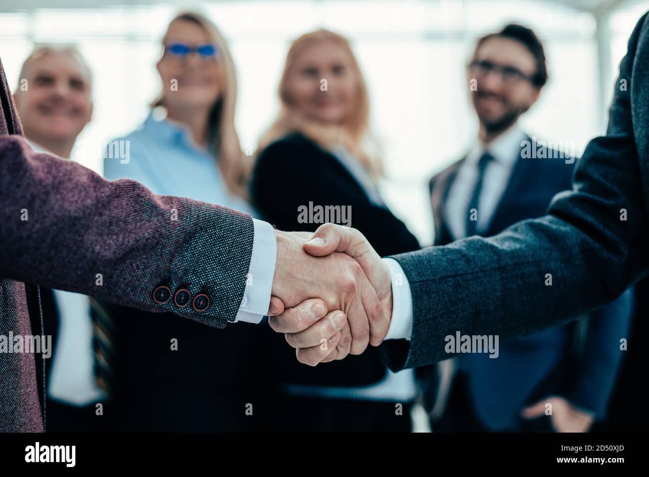 close up. business handshake on an office background Stock Photo - Alamy