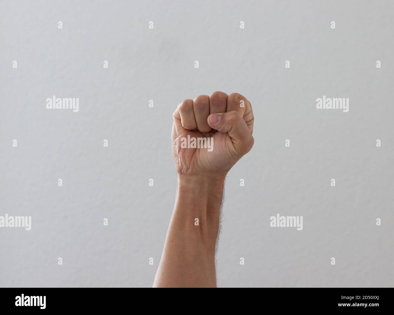 Hand with clenched a fist, isolated on a white background Stock Photo ...