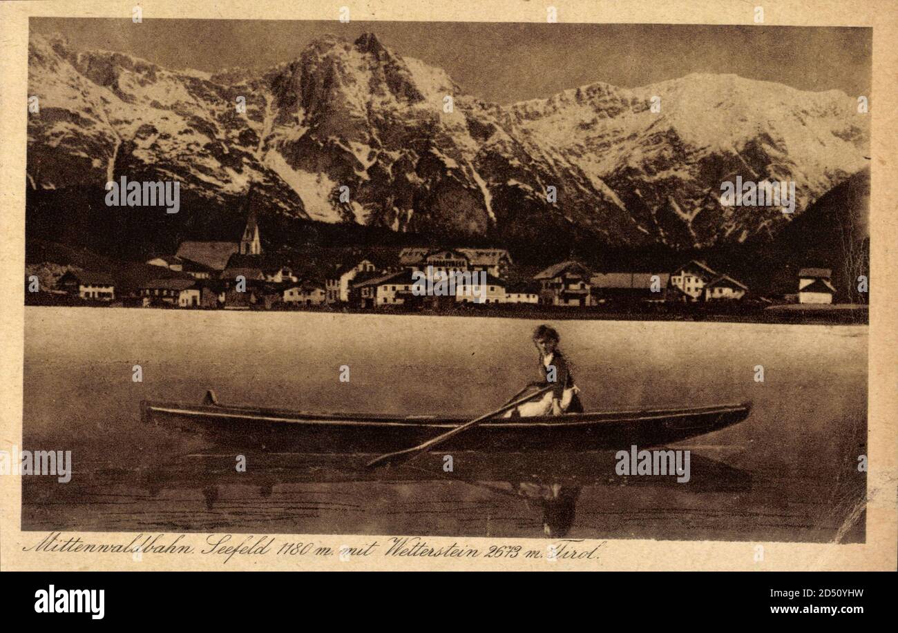 Seefeld Tirol, Frau im Ruderboot, Wetterstein | usage worldwide Stock ...