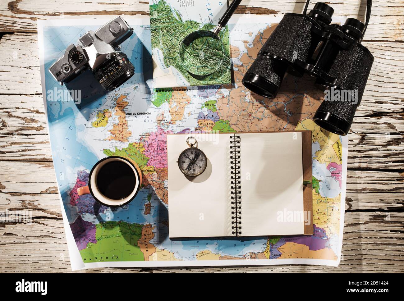 Binoculars compass on map compass hi-res stock photography and images - Alamy