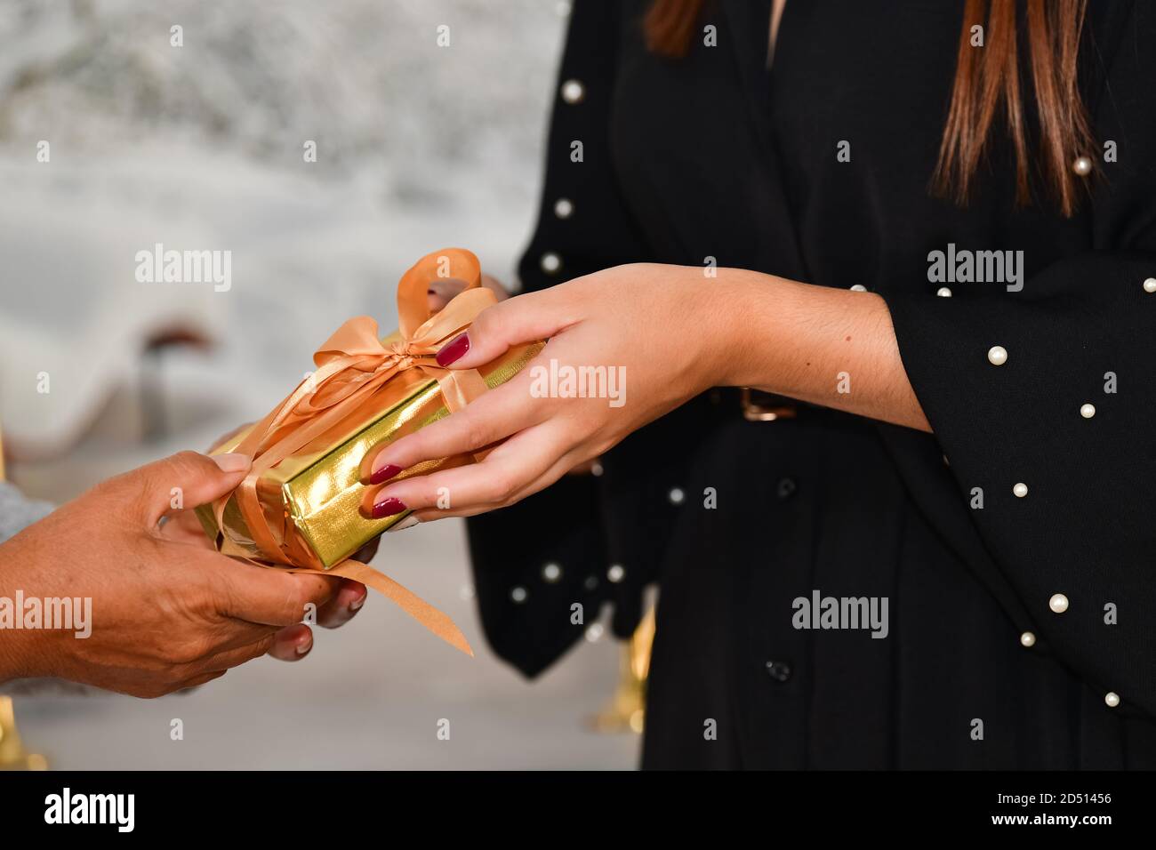 Hand giving paper another hand hi-res stock photography and images - Alamy